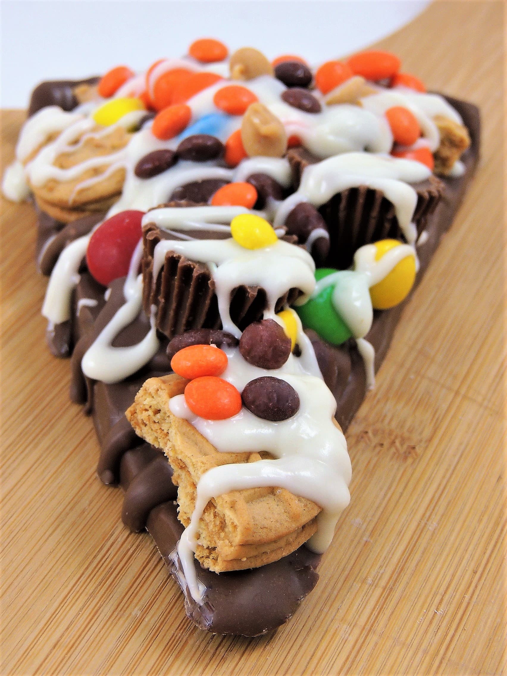 Peanut Butter Candy Avalanche - Chocolate Pizza Slice